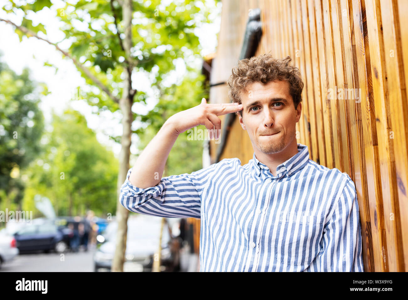 Man showing gun sign hi-res stock photography and images - Alamy