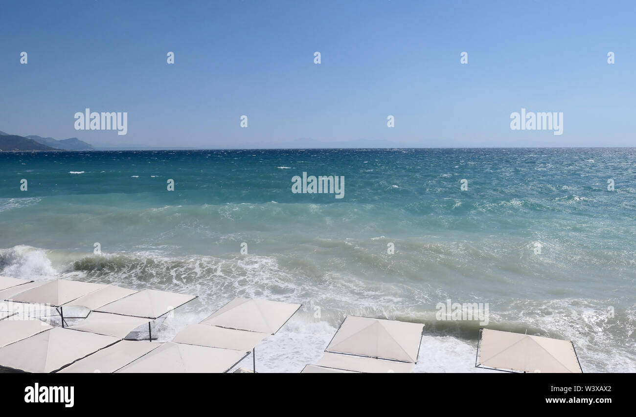 Windy weather on a beach Stock Photo - Alamy