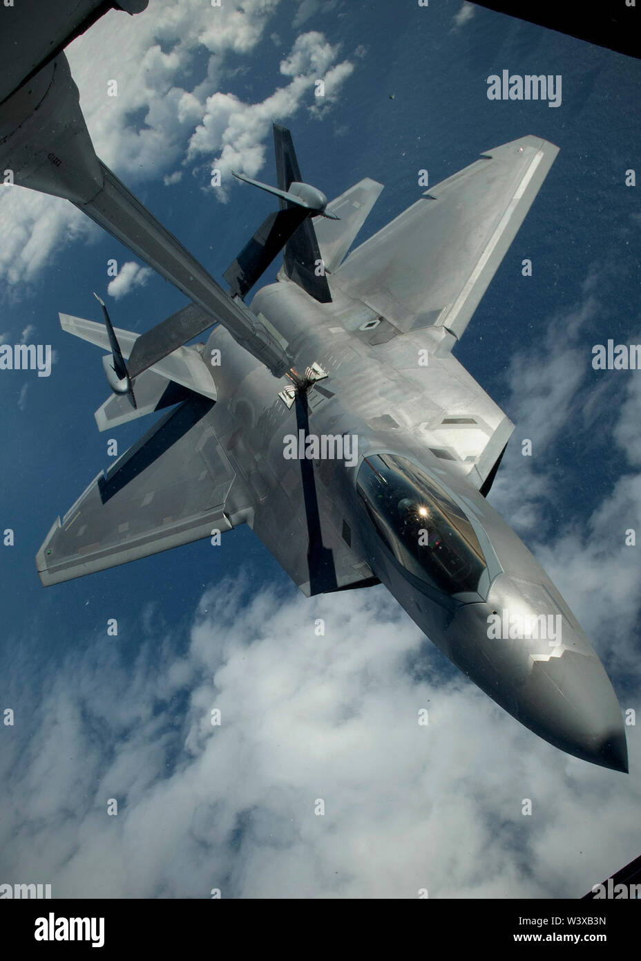 A U.S. Air Force F-22 Raptor is refueled July 14, over the Pacific ...