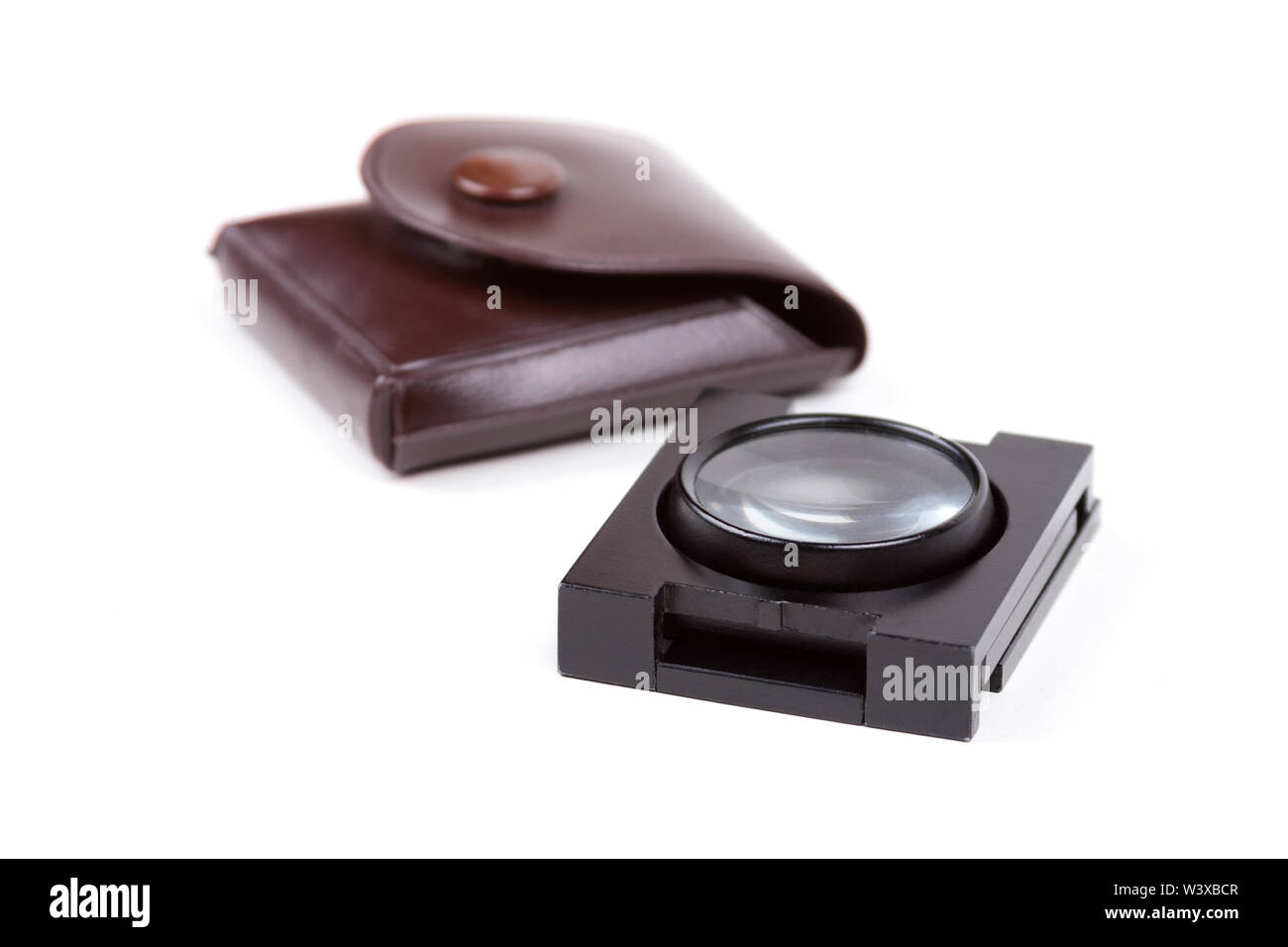 Folding loupe, numismatic coin magnifier with a brown leather case ...