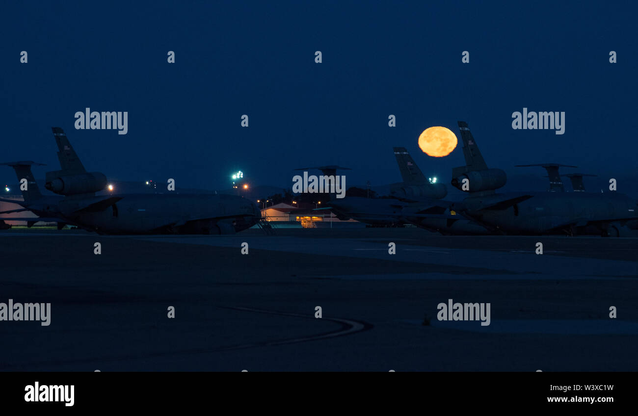 U.S. Air Force C-5M Super Galaxy and KC-10 Extender aircraft sit on the ...