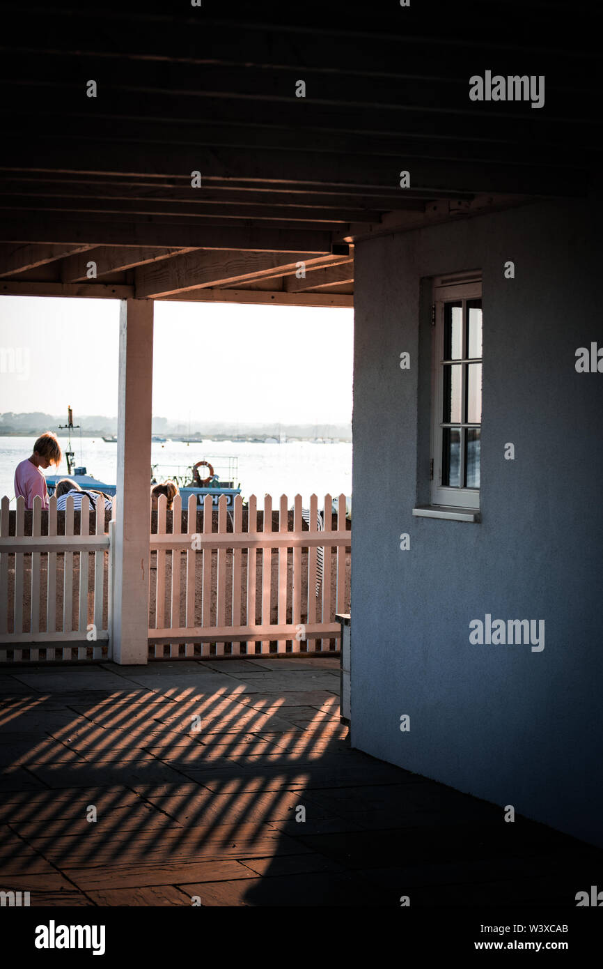 Exterior patio with a golden shadow from sunset Stock Photo - Alamy