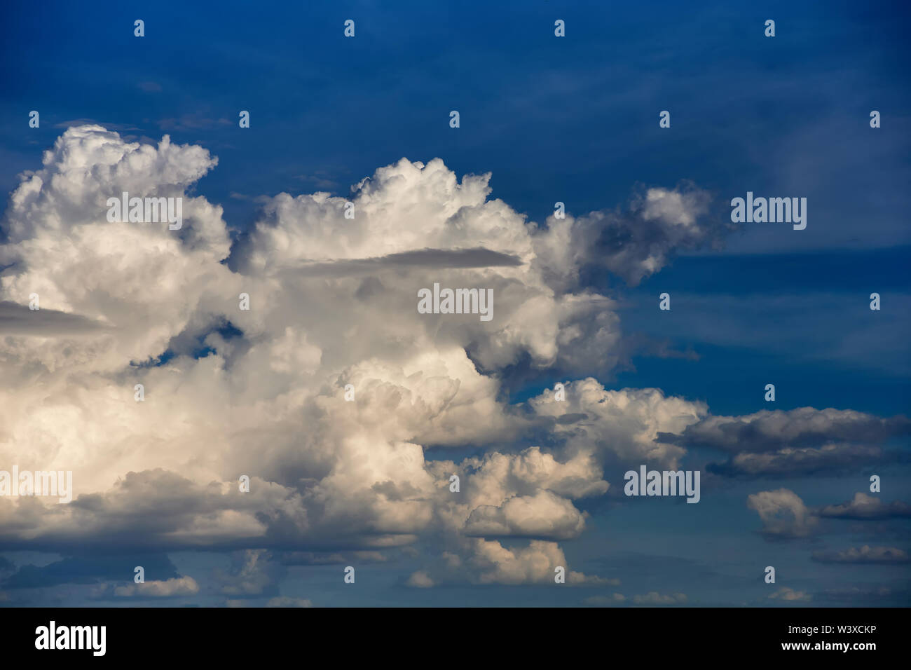 The dramatic white cloud in rainy season Stock Photo - Alamy