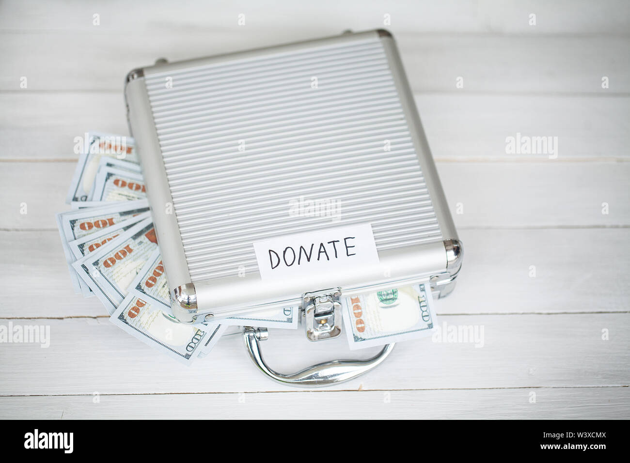 Donation Concept. Case with Dollars on White Background. Donations ...