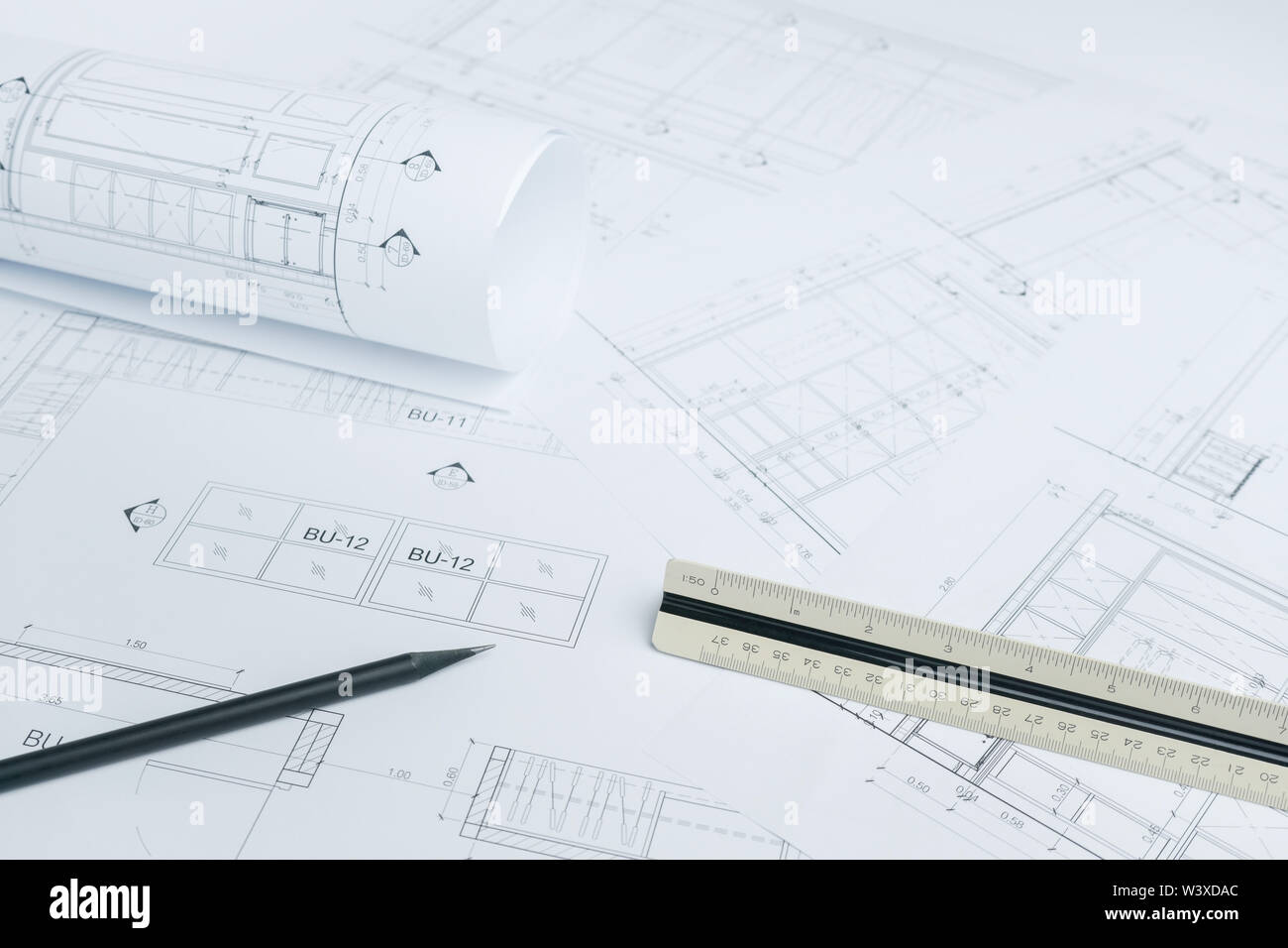 black pencil on architectural drawing paper and rolls for construction ...
