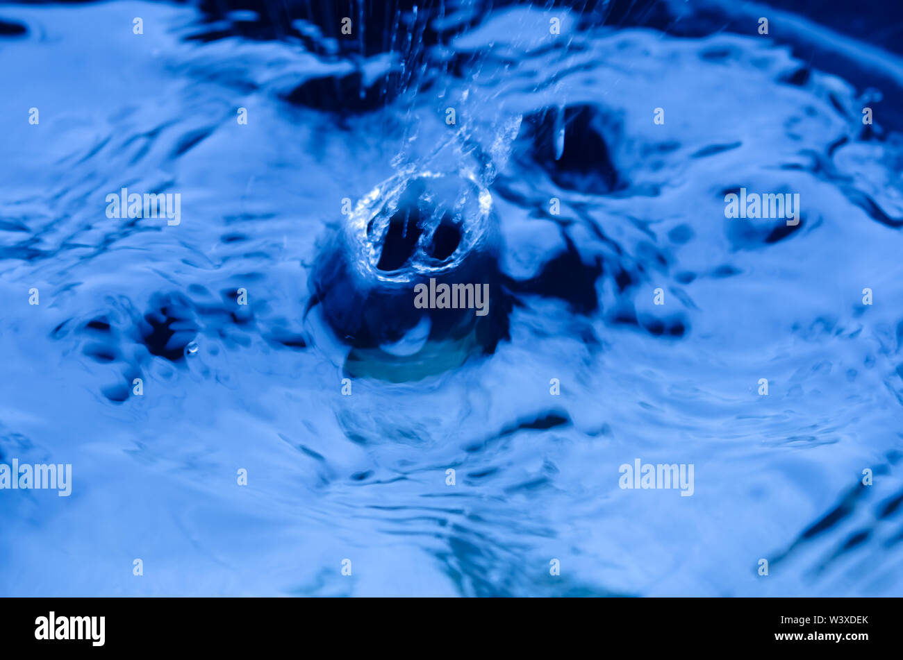 drop of water splash in blue color Stock Photo - Alamy