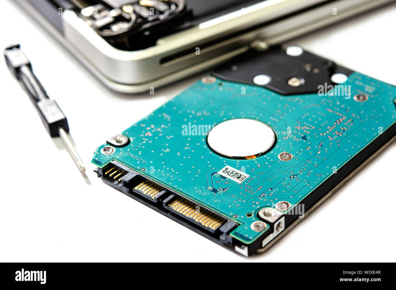 Hard drive notebook computers on the white background Stock Photo - Alamy