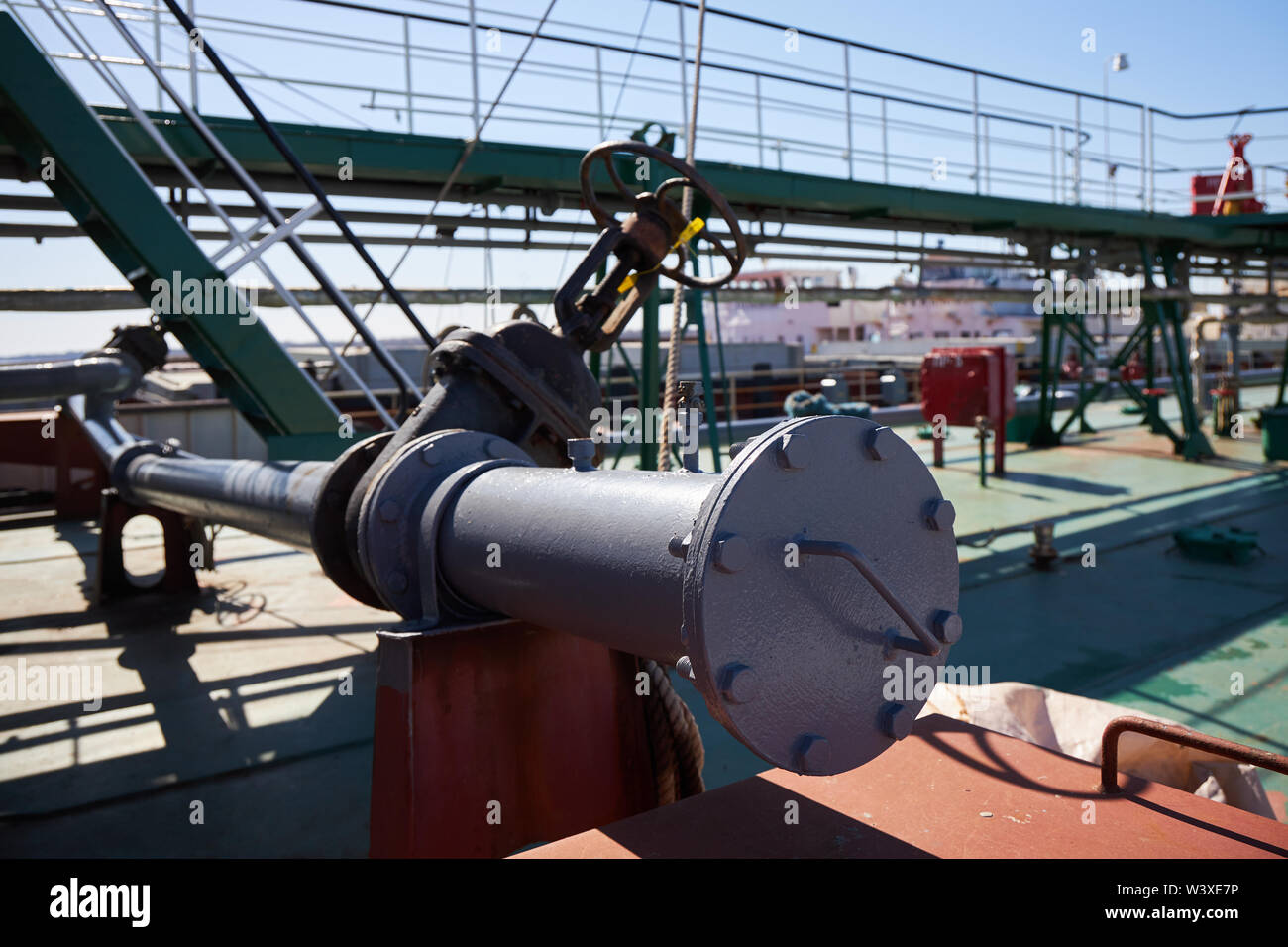 Pipeline for discharging liquid cargo on an oil tanker Stock Photo - Alamy