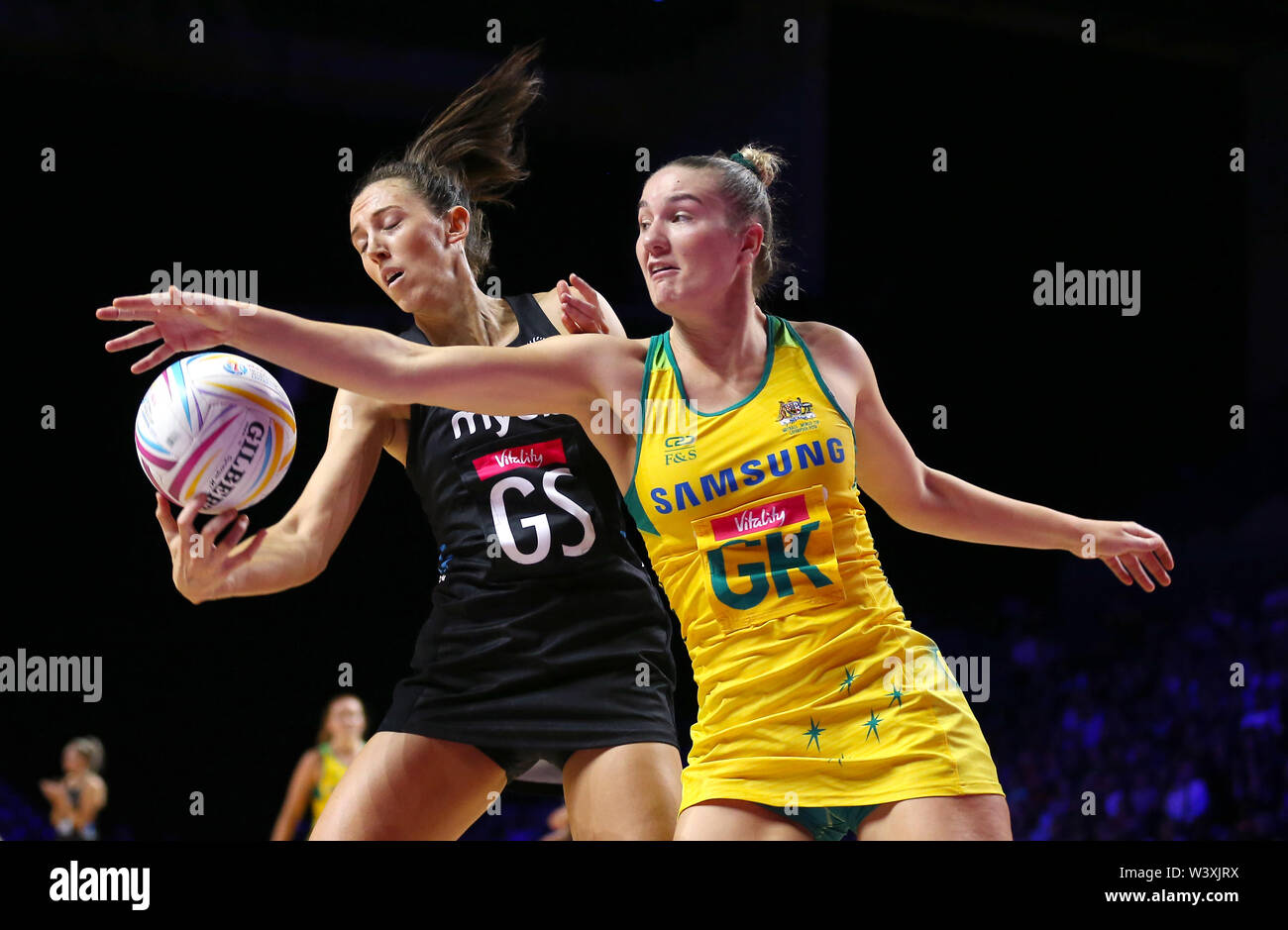 New Zealand's Bailey Mes (left) and Australia's Courtney Bruce battle ...