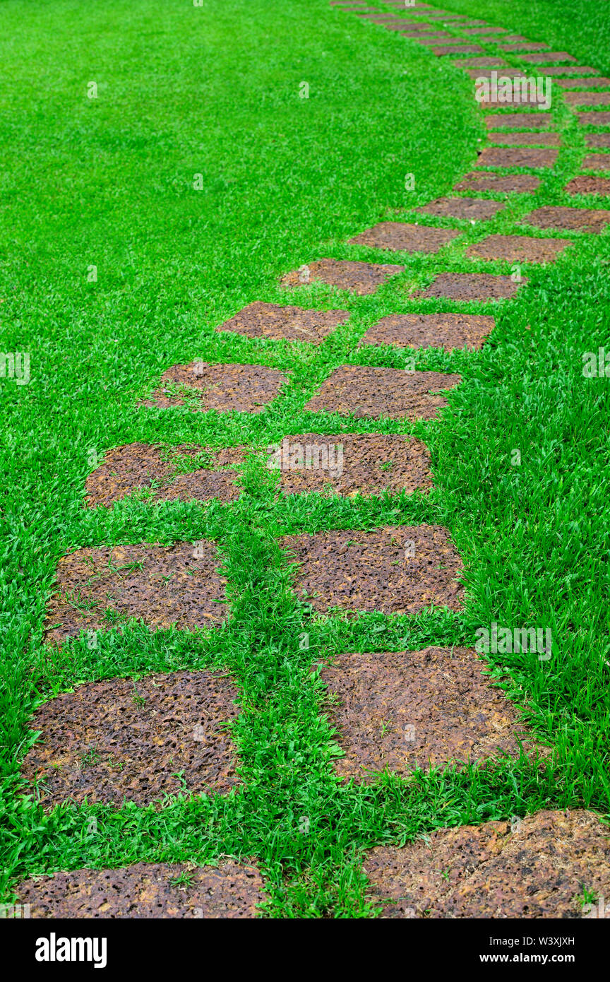 Stone path in the infield grass Stock Photo - Alamy