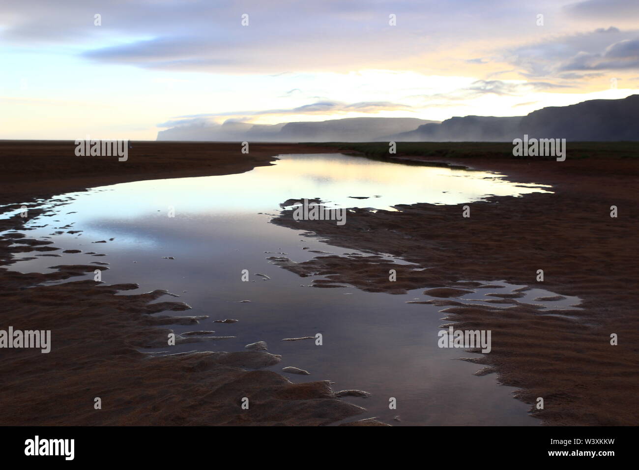 July dusk Rauðasandur beach, the most famous one in Iceland, is a sand ...