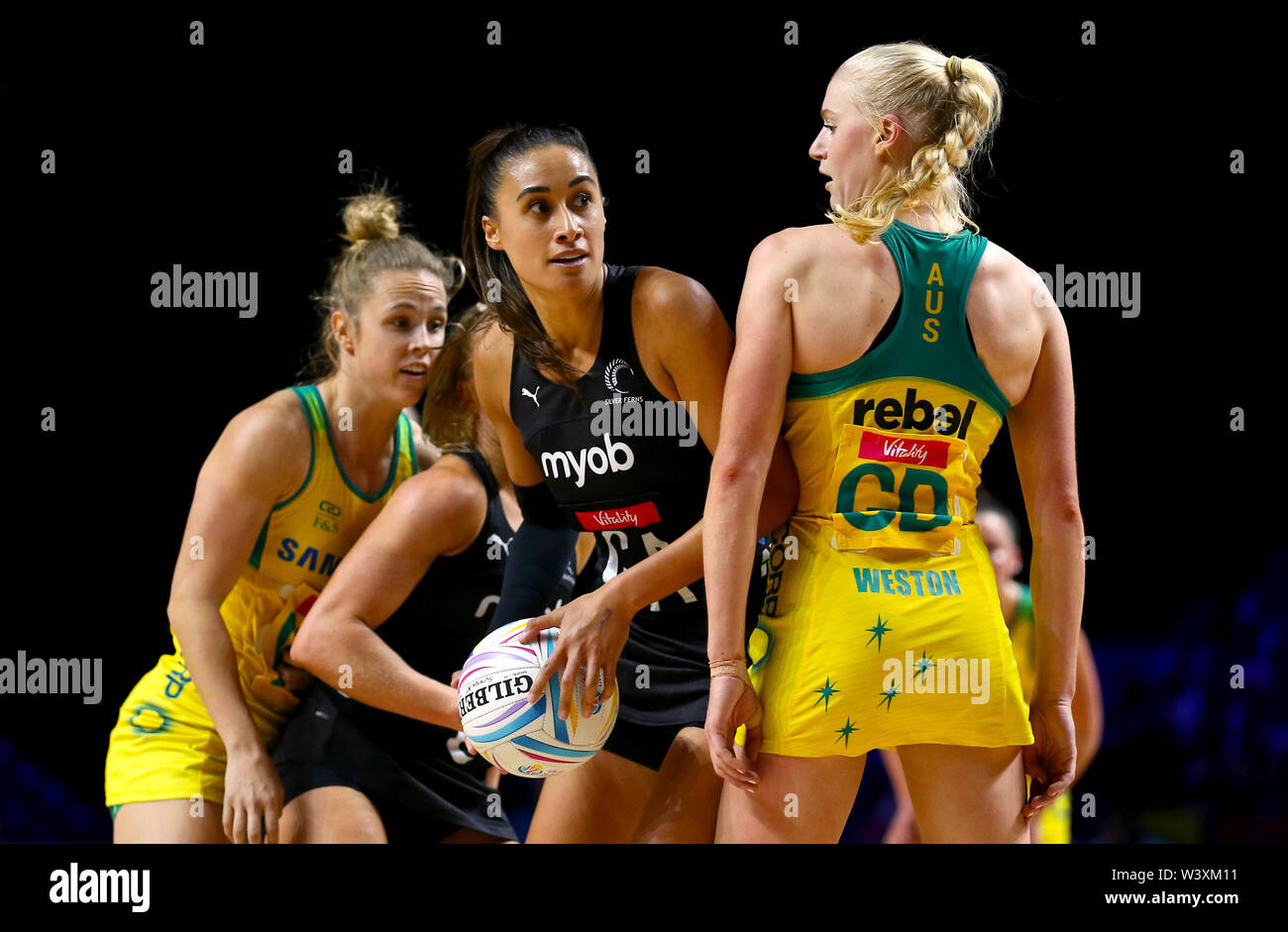 New Zealand's Maria Folau (centre) and Australia's Jo Weston during the ...