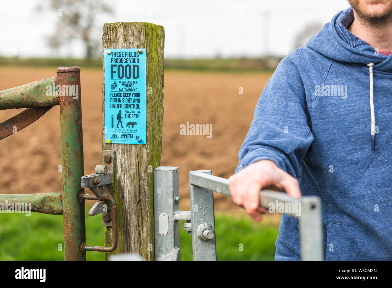 Dog walking sign in the countryside UK Stock Photo - Alamy