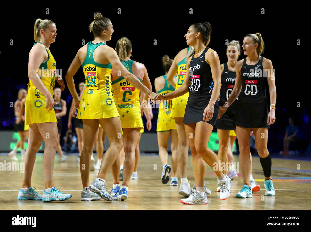 Australia's Sarah Klau shakes hands with New Zealand's Karin Burger ...