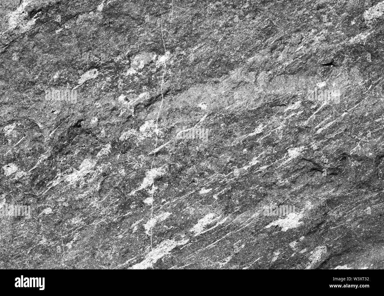 Natural dark gray granite stone, background photo texture with relief ...