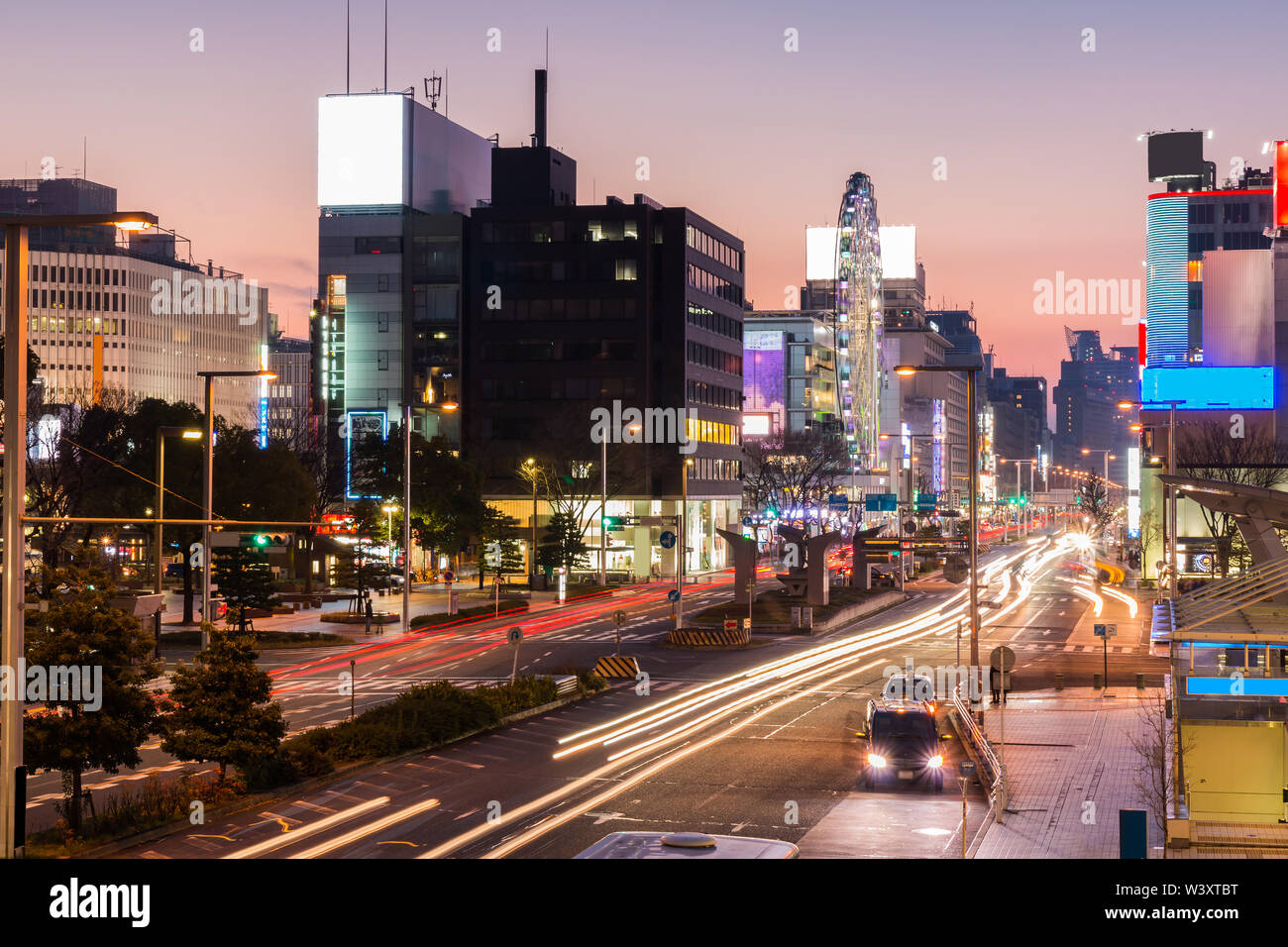 light trails on the street at dusk in sakae,nagoya city - japan Stock ...