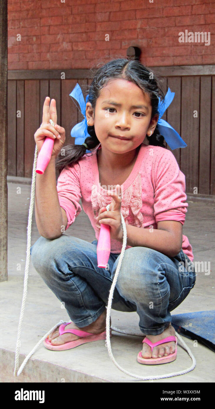 Girl with a jump rope hi-res stock photography and images - Alamy