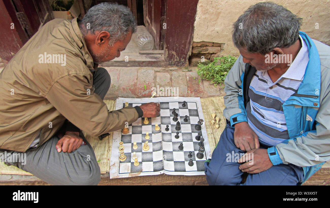 Two men playing chess Stock Photo - Alamy