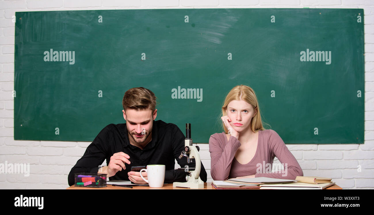 Modern school. Knowledge day. Back to school. Couple of man and woman ...