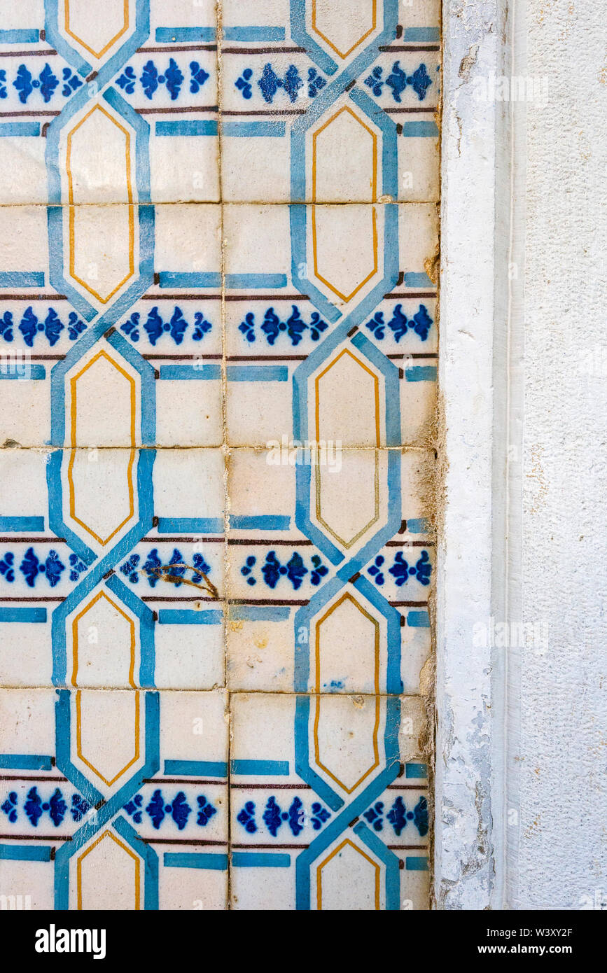 Close up traditional portuguese ceramic tiles ( Azulejos) on the facade ...