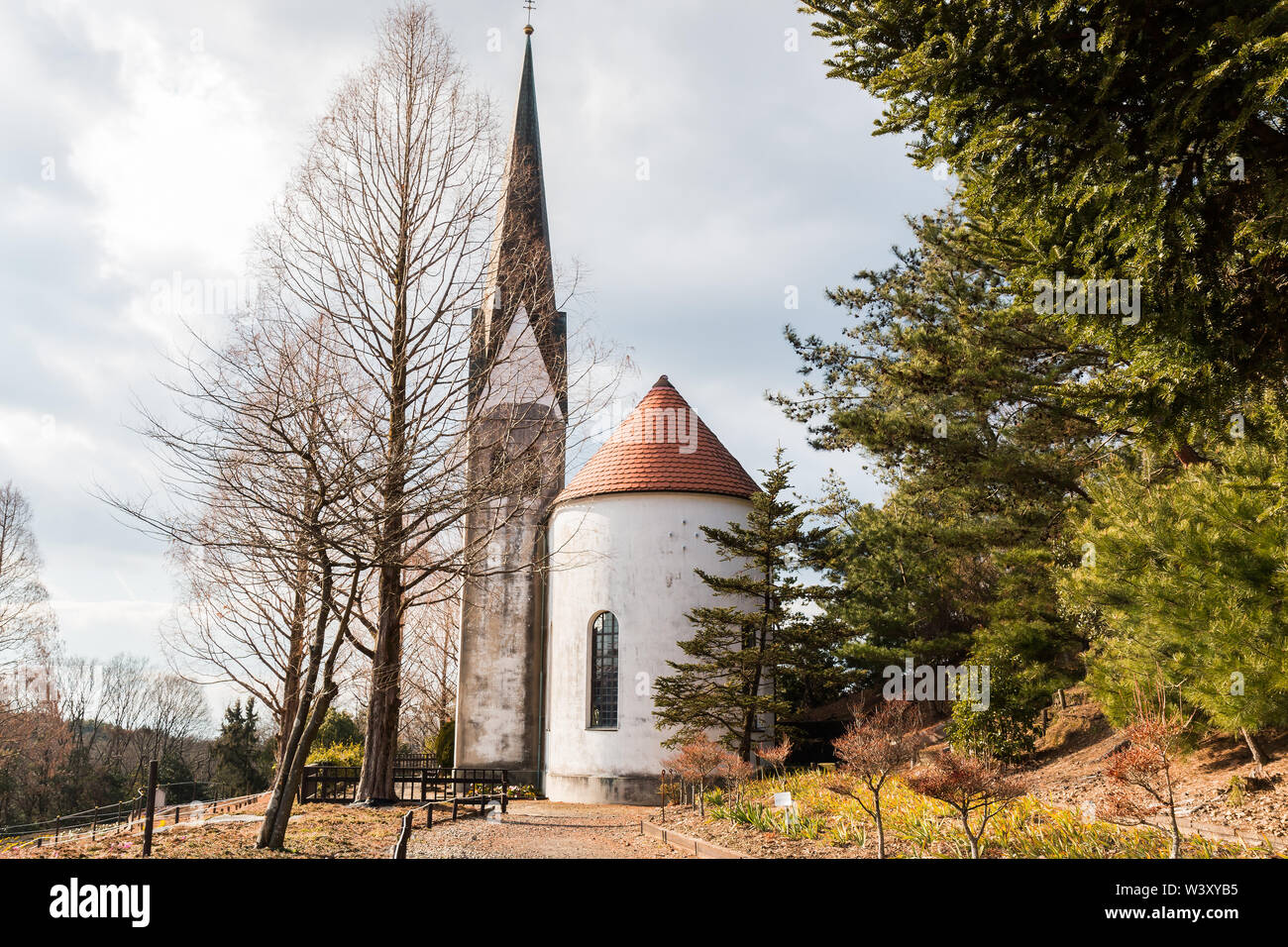 Countryside church in forest, autumn Stock Photo - Alamy