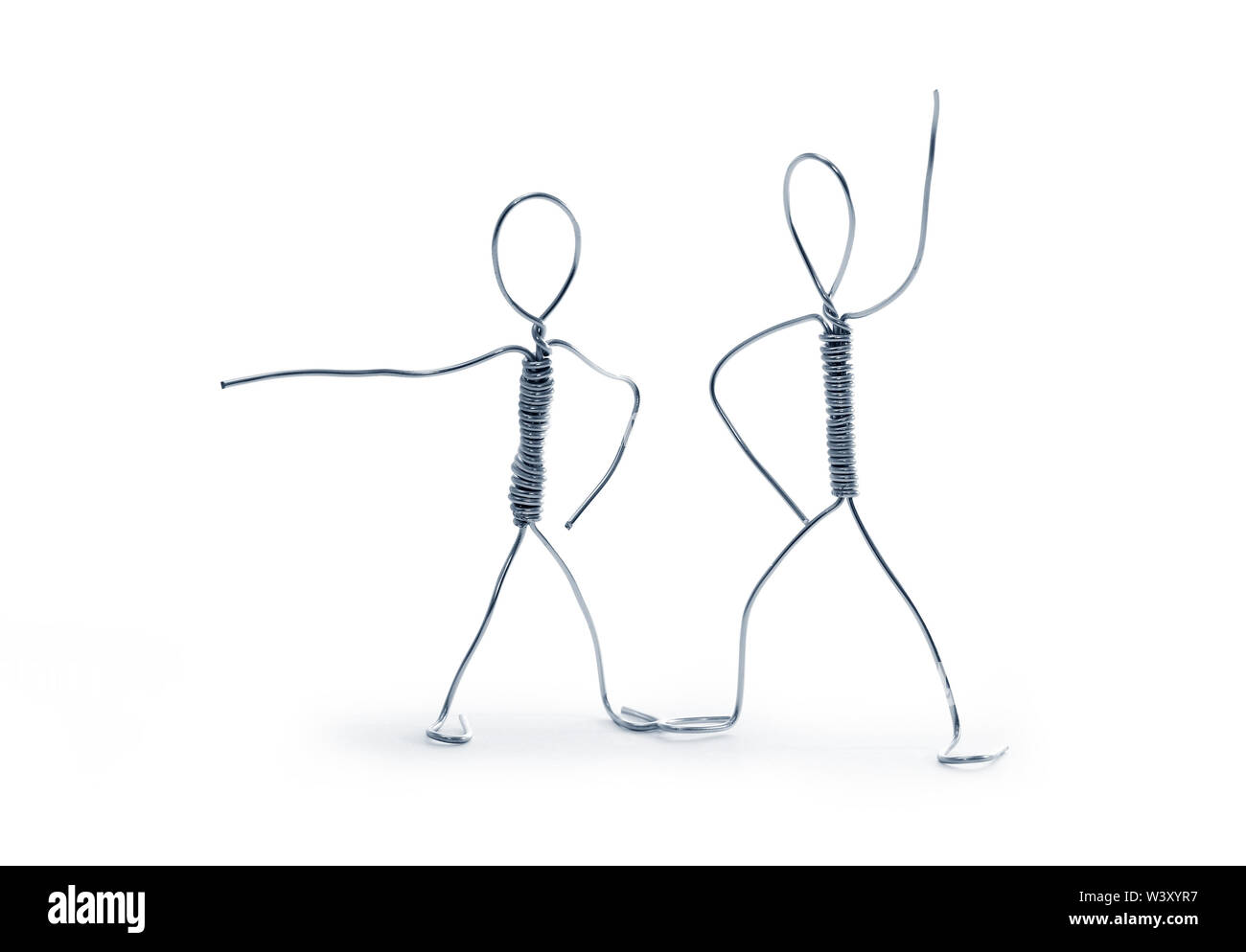 Two men made from aluminum wire discussing on white background Stock ...