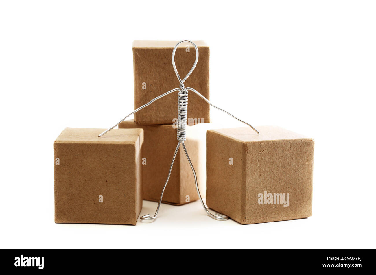 Man made from aluminum wire among few cardboard boxes Stock Photo - Alamy