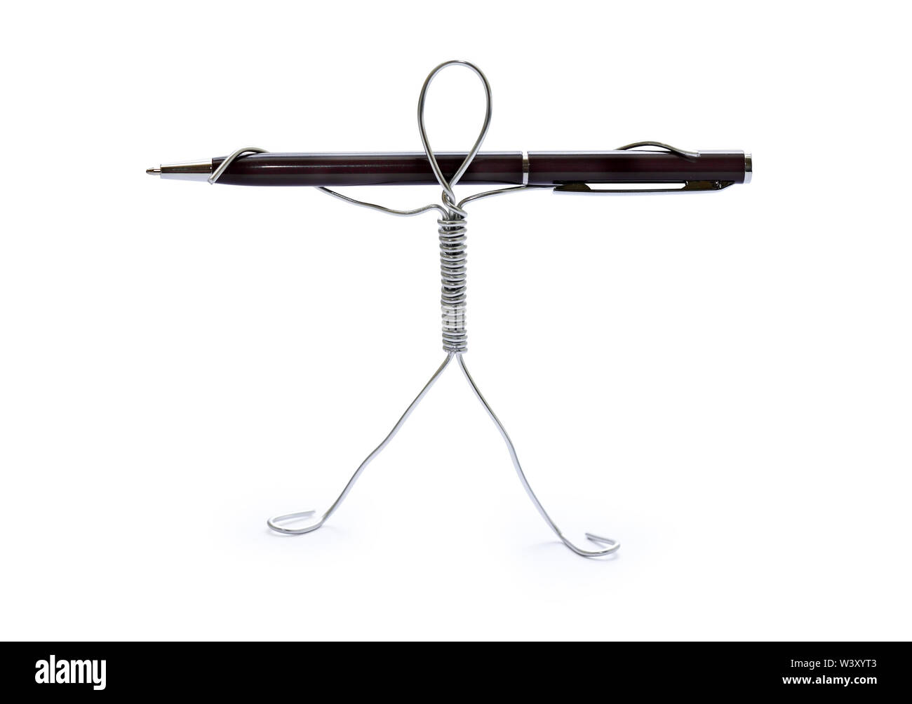 Man made from aluminum wire holding ballpoint pen Stock Photo - Alamy