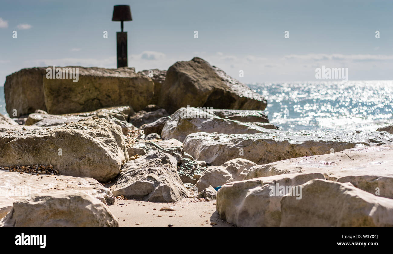 Man made breakwater with warning post at its end at Sandbanks Stock ...