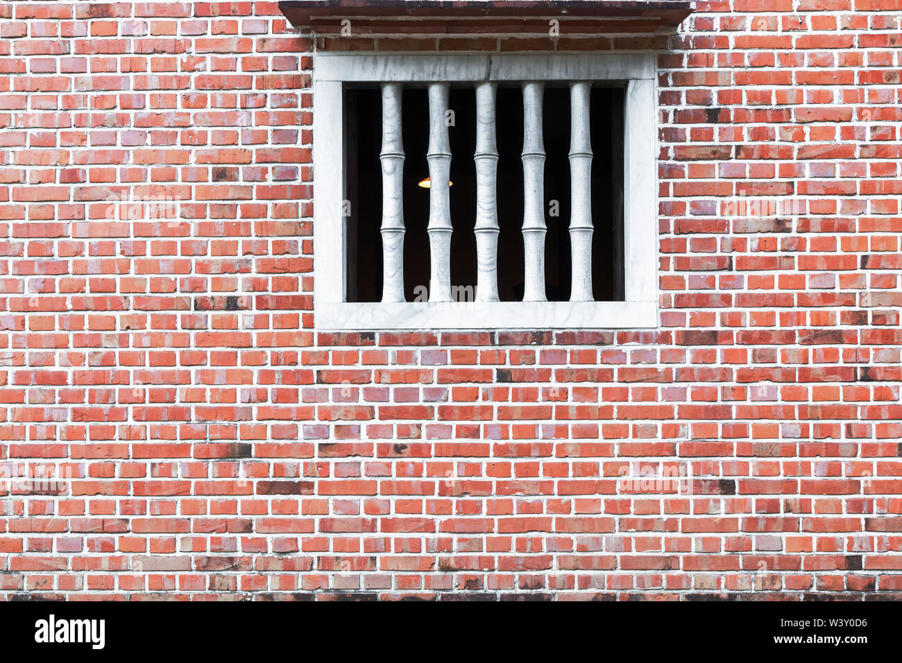 Old red brick wall with White Window Stock Photo - Alamy