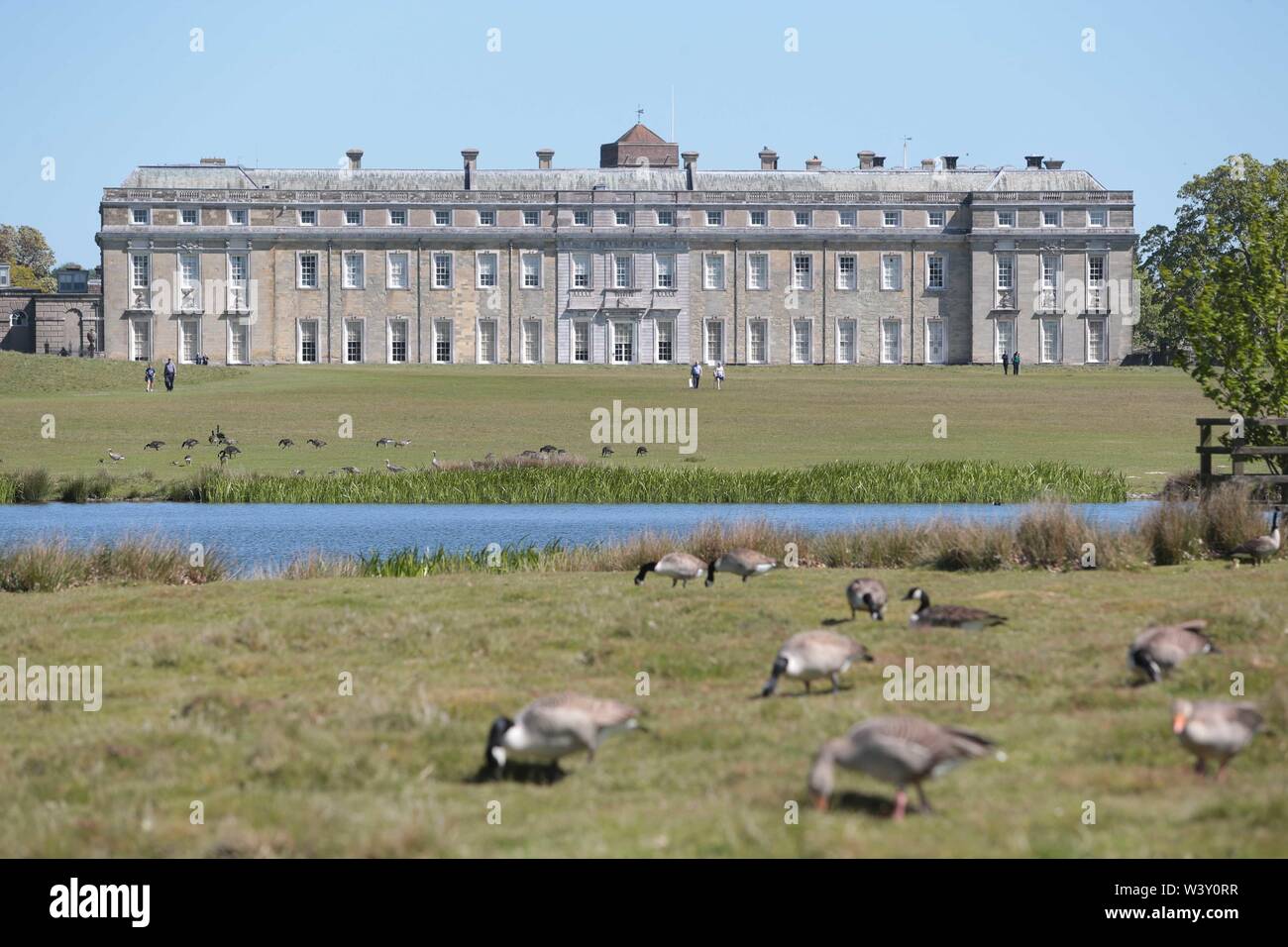 Petworth House in the parish of Petworth, West Sussex, England, is a ...