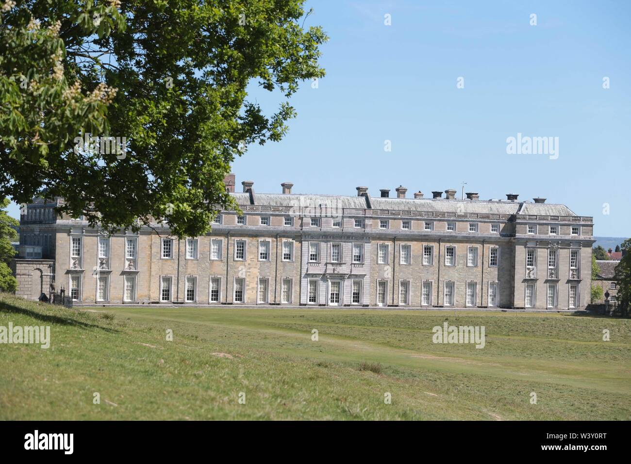 Petworth House in the parish of Petworth, West Sussex, England, is a ...