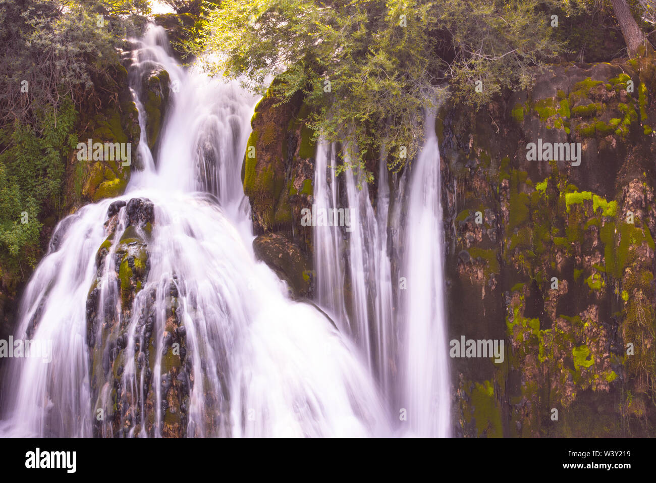 Amazing nature landscape, beautiful waterfall with sunlight in deep ...