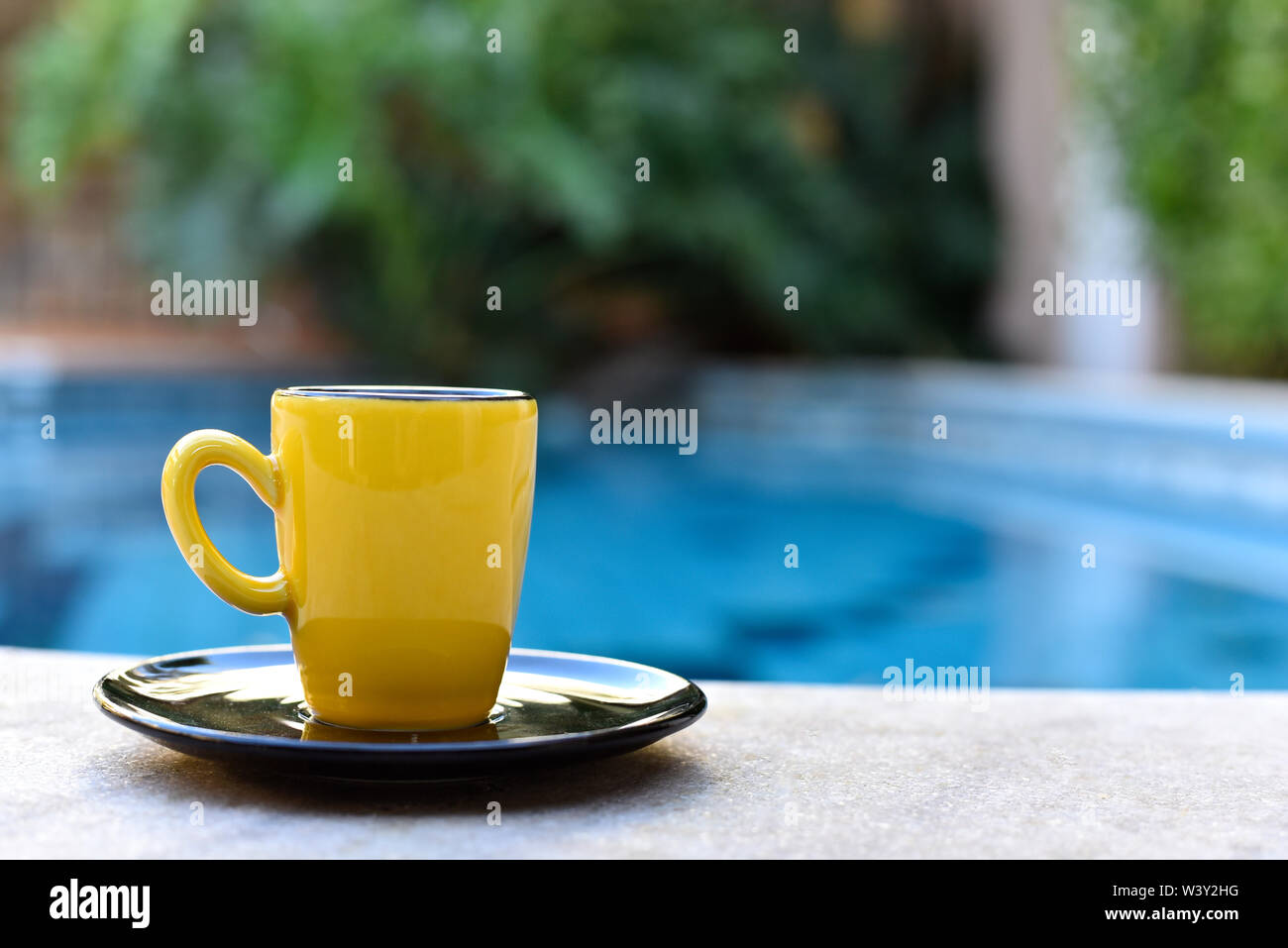 yellow coffee bean by the pool Stock Photo - Alamy
