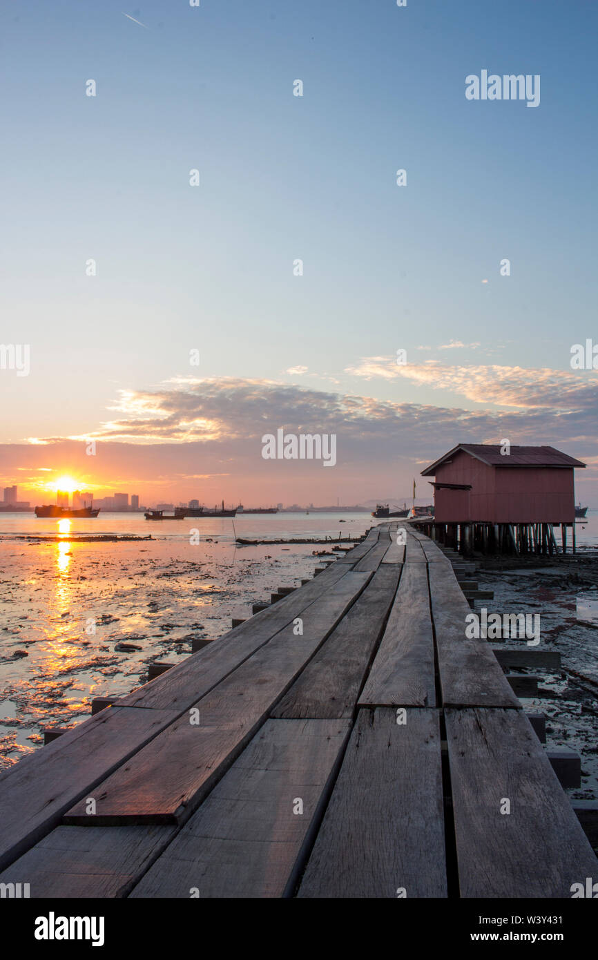 Wooden bridge Clan Tan Jetty view during sunrise in George Town, Penang Stock Photo - Alamy