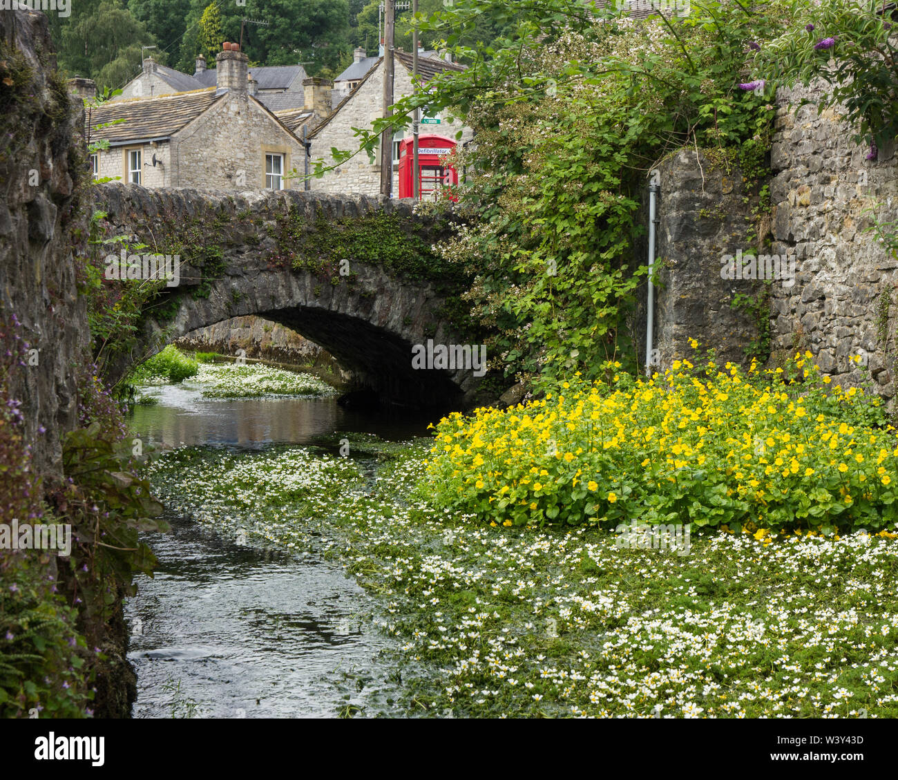 view of Crow foot bridge in Bradwell village in Derbyshire, England UK ...