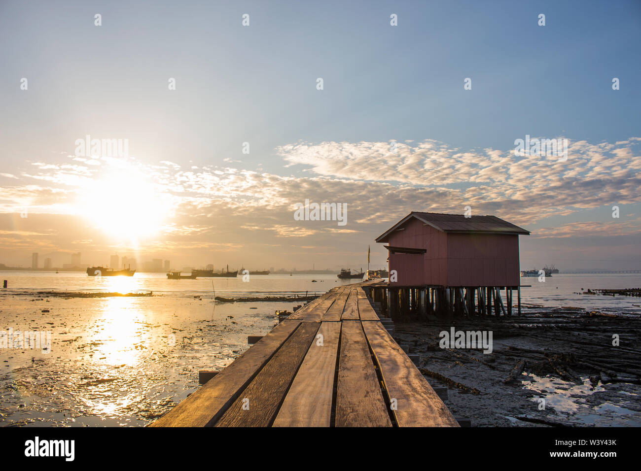 Wooden bridge Clan Tan Jetty view during sunrise in George Town, Penang Stock Photo - Alamy