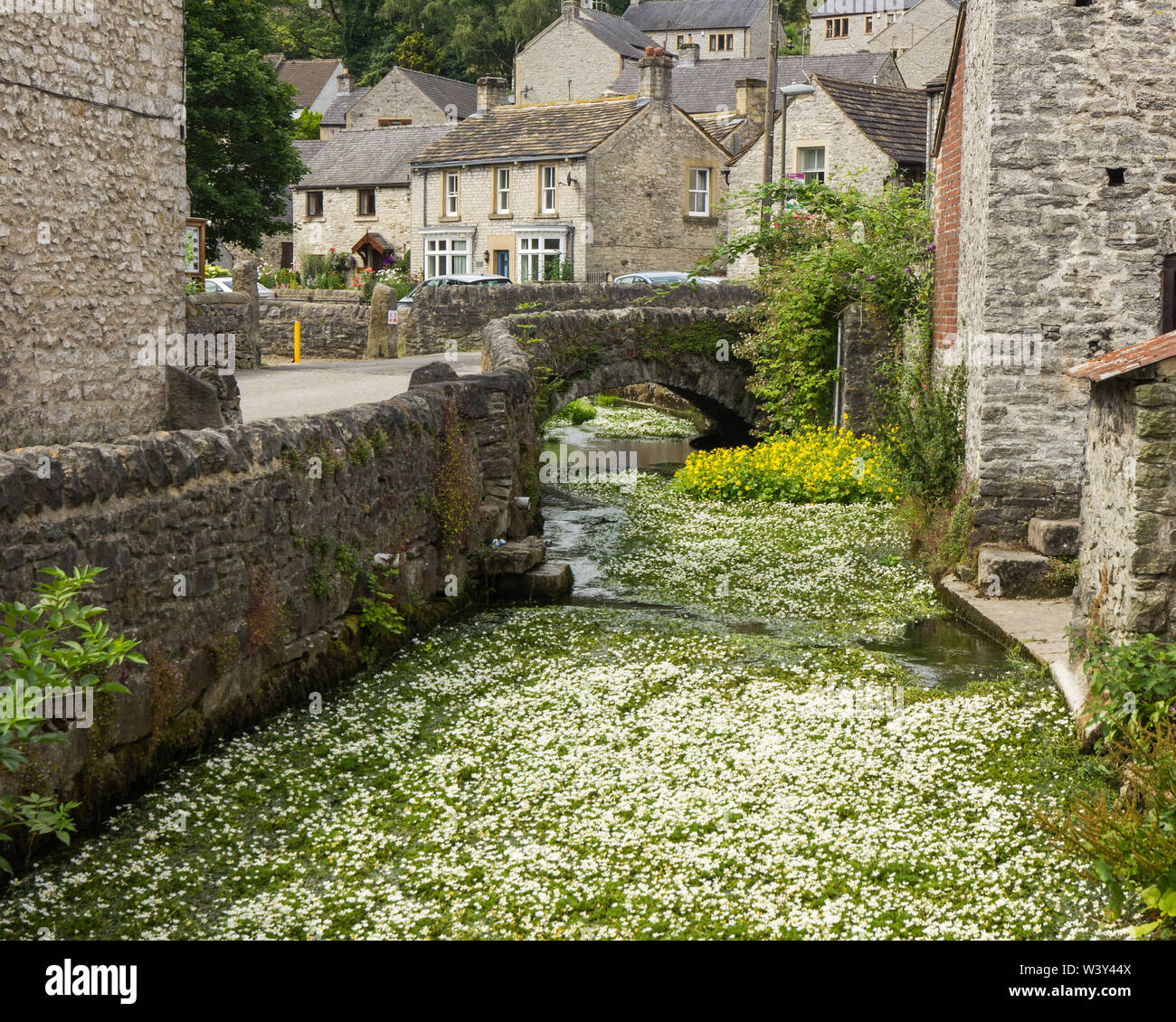 view of Crow foot bridge in Bradwell village in Derbyshire, England UK ...