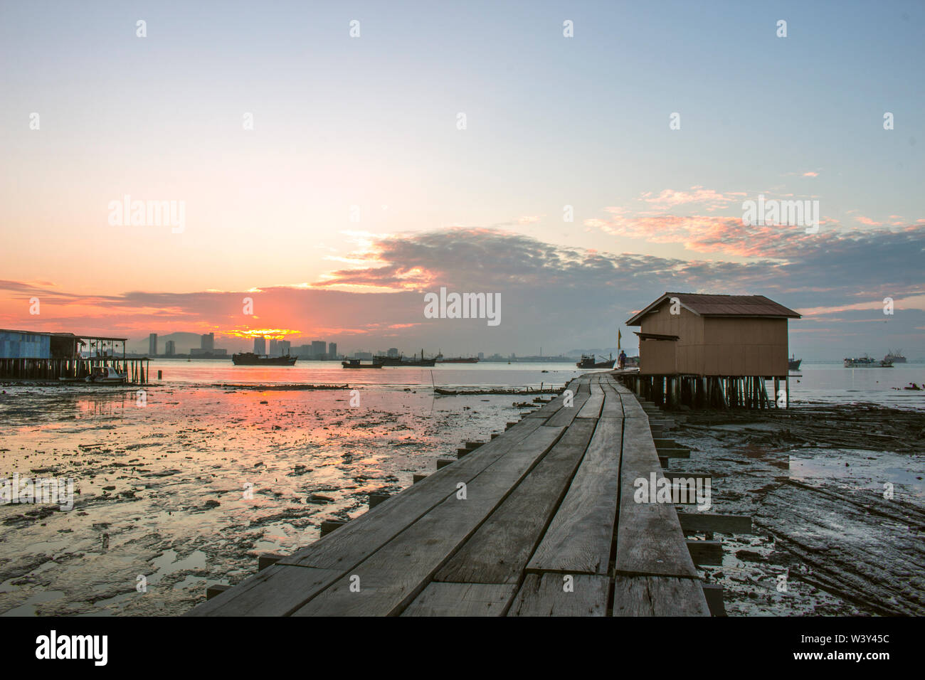 Wooden bridge Clan Tan Jetty view during sunrise in George Town, Penang Stock Photo - Alamy