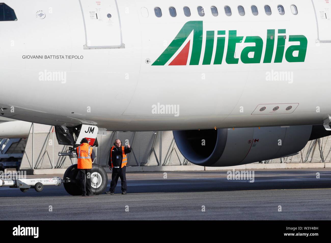 Alitalia aeroplane is prepared for departure at Leonardo da Vinci ...