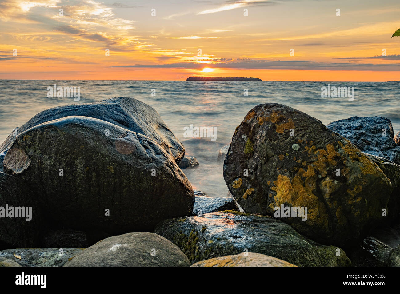 Sunrise with Stone formation and lake view at Innisfil Beach Park Stock ...