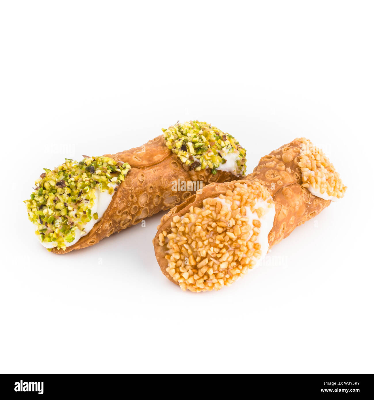 Two cannoli pastries. Traditional Sicilian dessert, filled with a rich ...