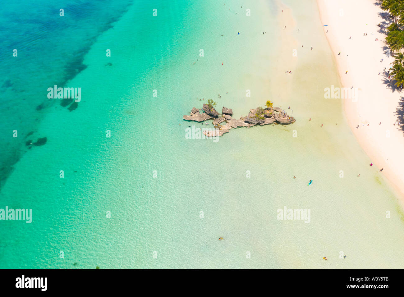 White sand beach and lagoon with turquoise water, aerial view. Coast of ...