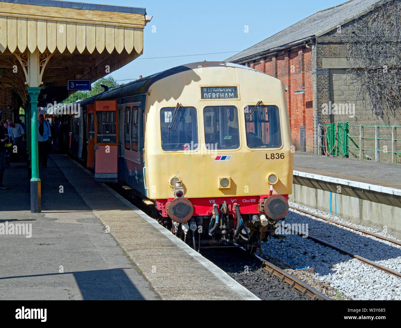 A class 101 first generation diesel railcar stands at Dereham Station ...