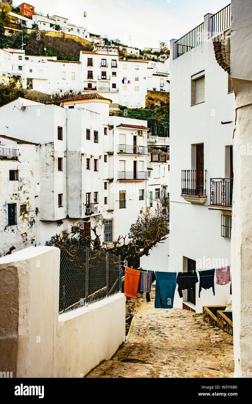 Narrow pedestrian lane between whitewashed houses Stock Photo - Alamy