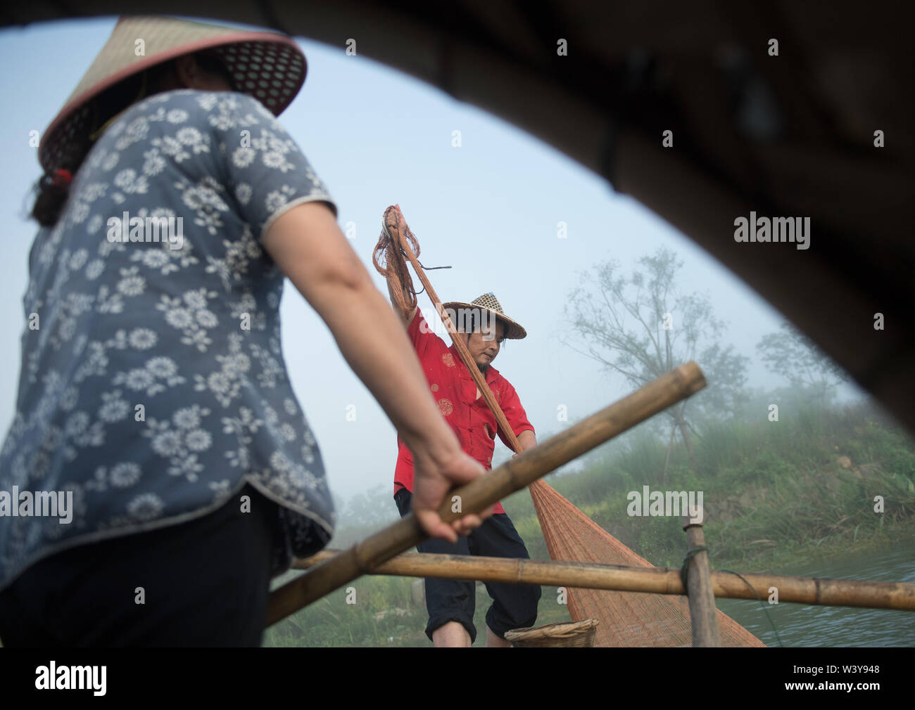 Jiande, China. 18th July 2019. Tang Linglong (R) and Shao Zhulian ...