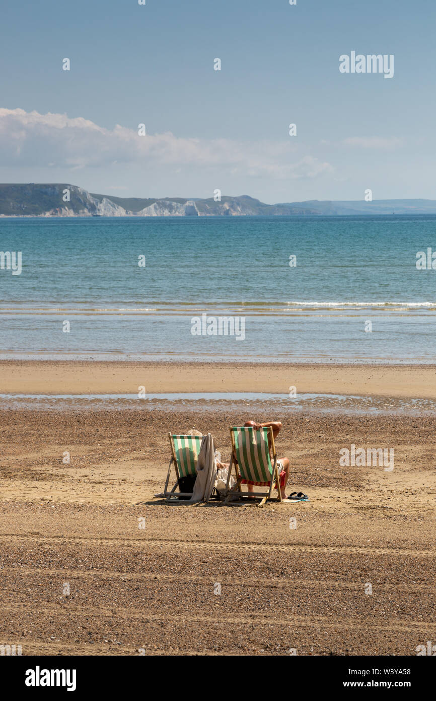 Two people at the beach two people at the beach hi-res stock ...