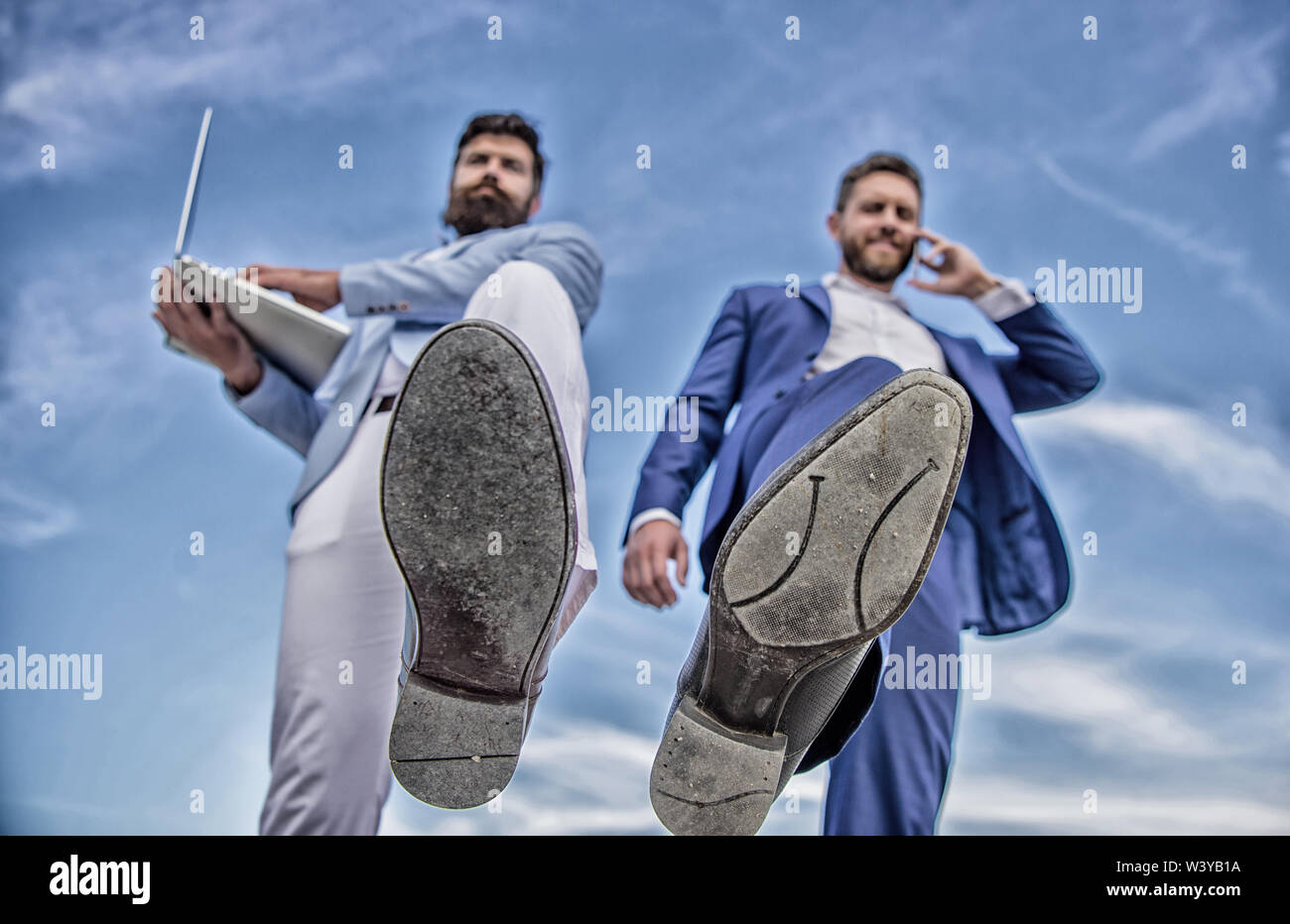 Businessmen making step bottom view. Business technologies coming. Big ...