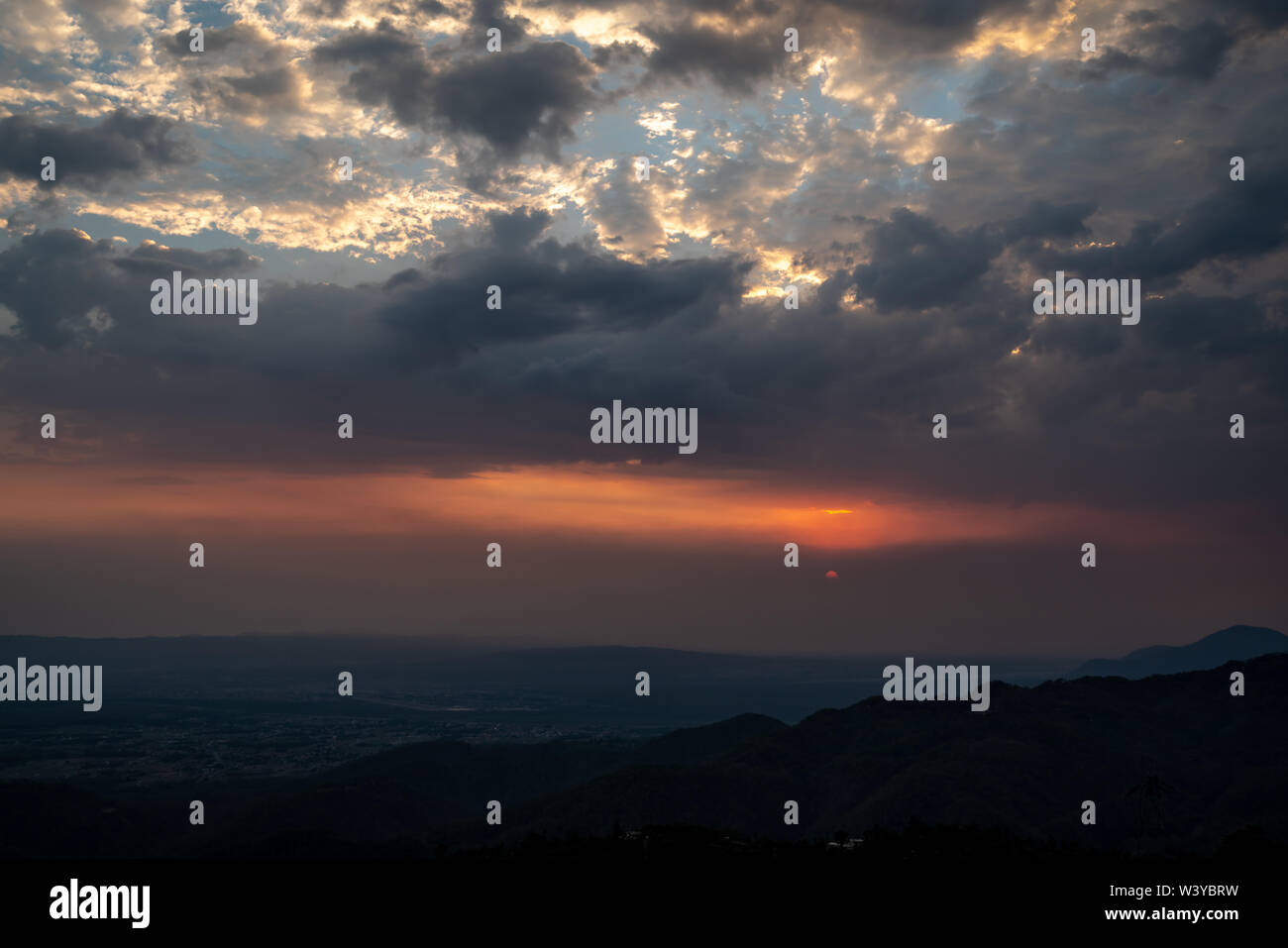 sunsets light up sky in Rishikesh, Uttarakhand, India Stock Photo - Alamy