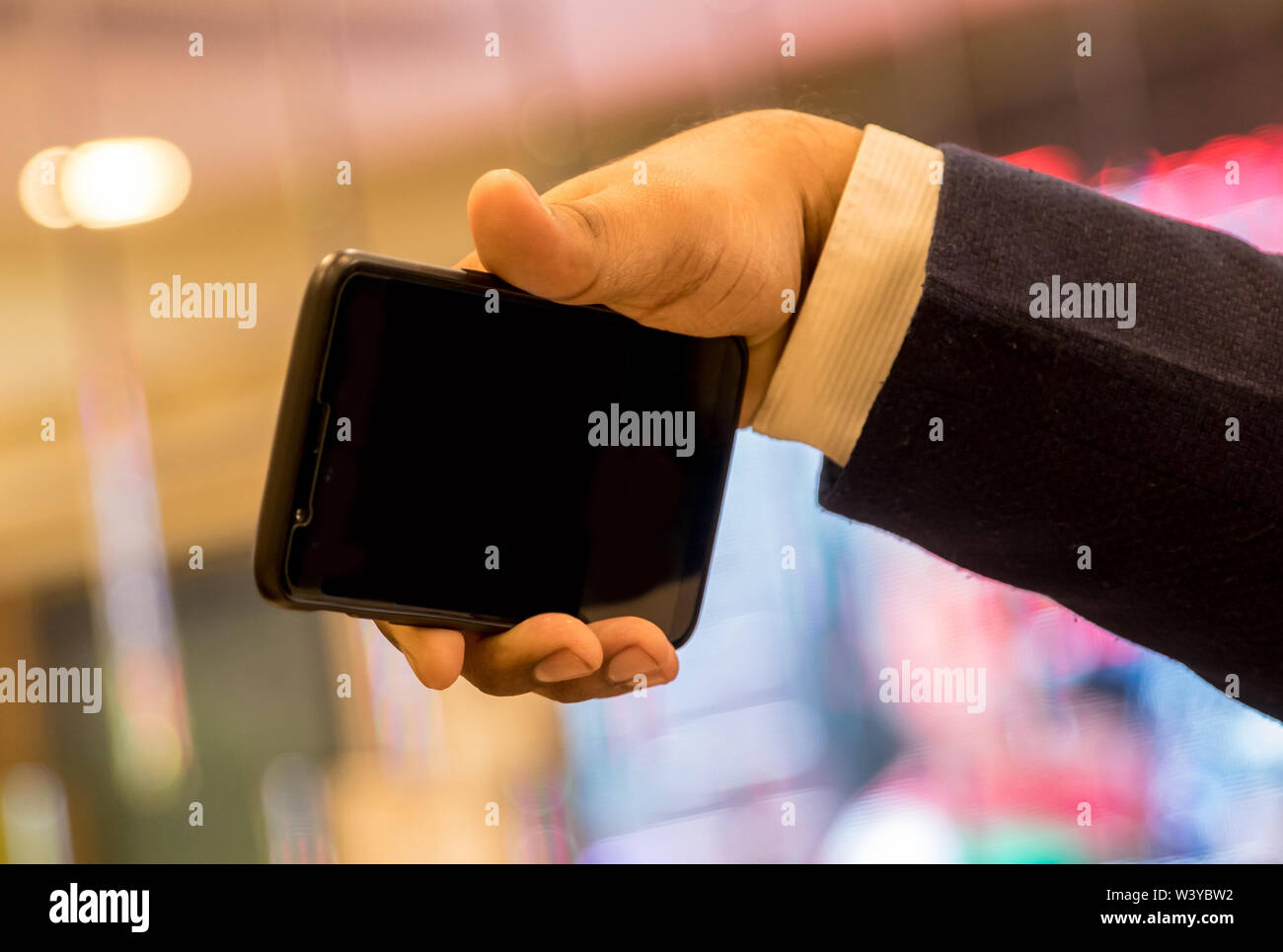 hand holding mobile smart phone Stock Photo - Alamy